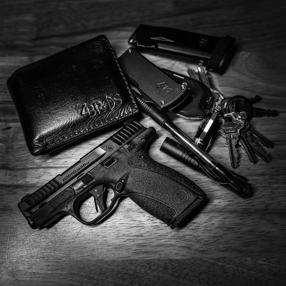 Custom Gun Holsters & Carry Essentials – Four Brothers
